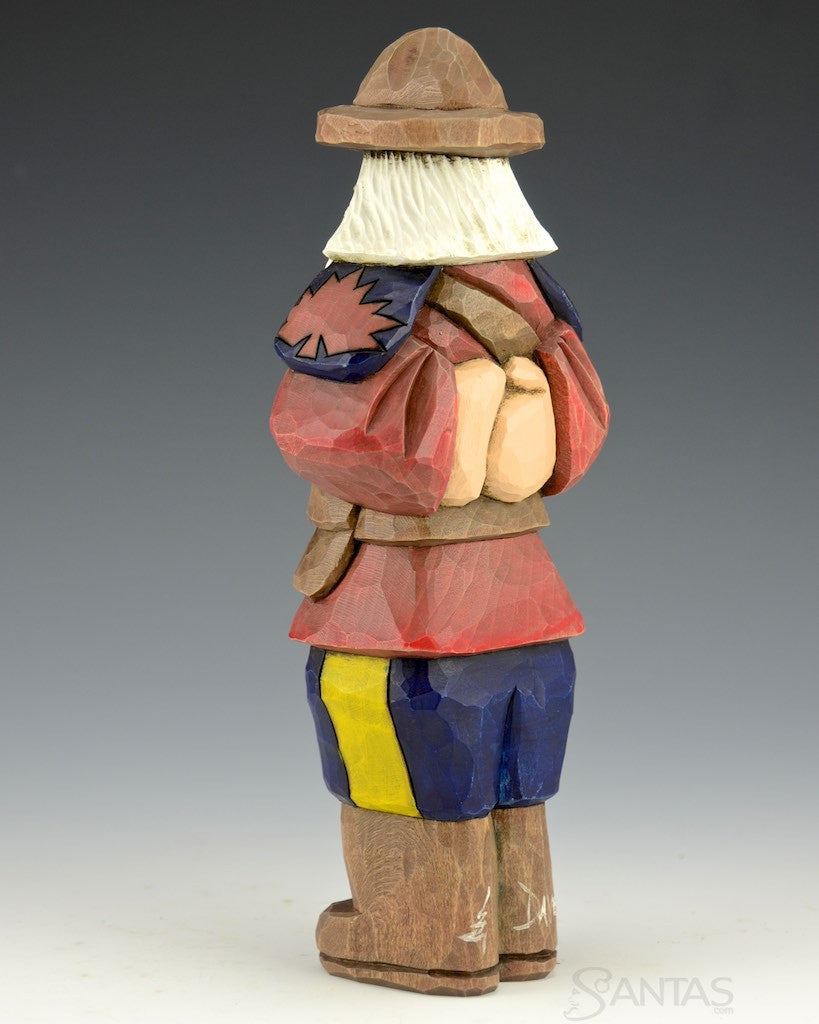 Dave Francis Canadian Mountie Santa Carving 9" | santas.com
